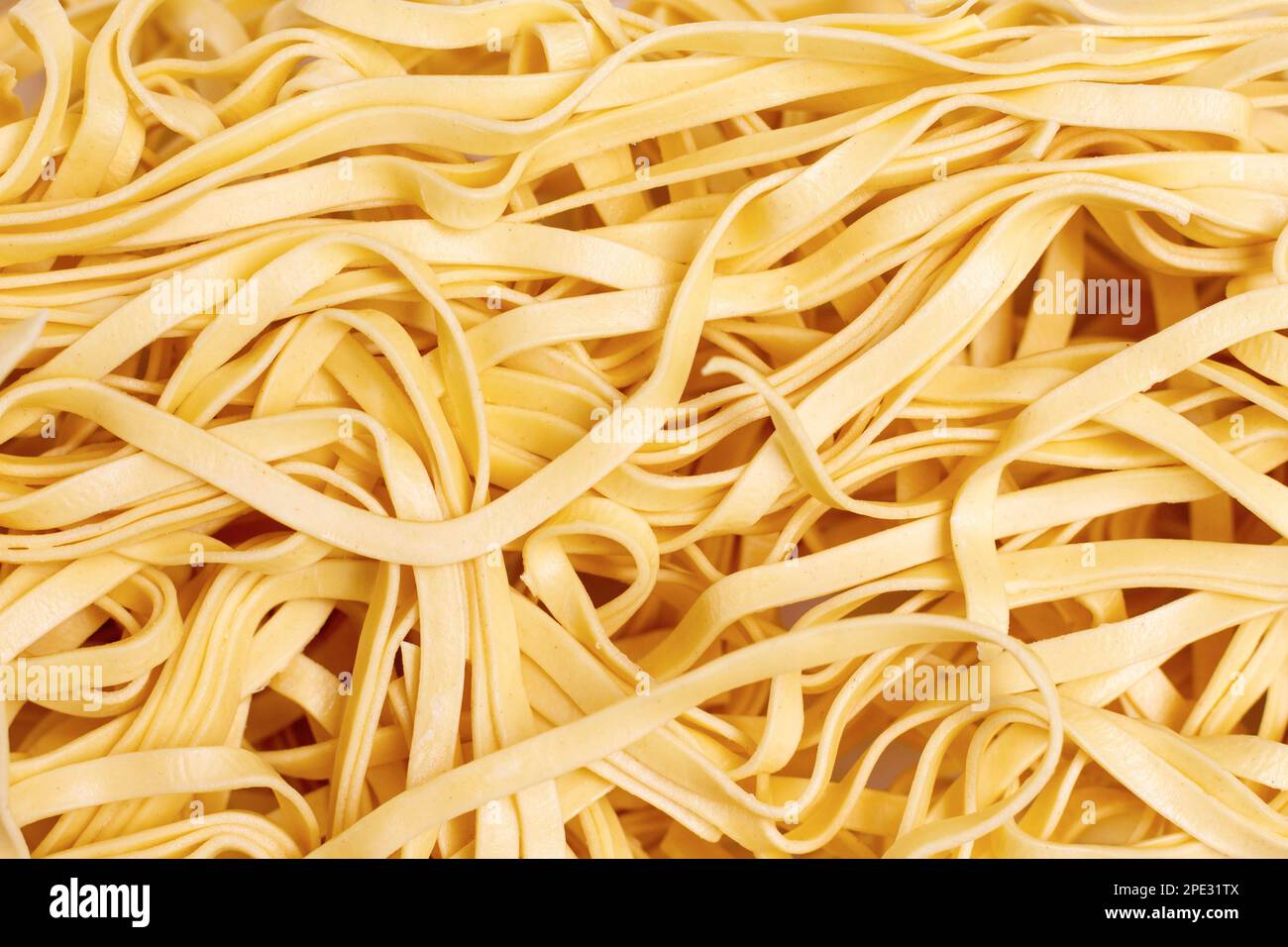 Closeup of raw noodle texture Stock Photo - Alamy