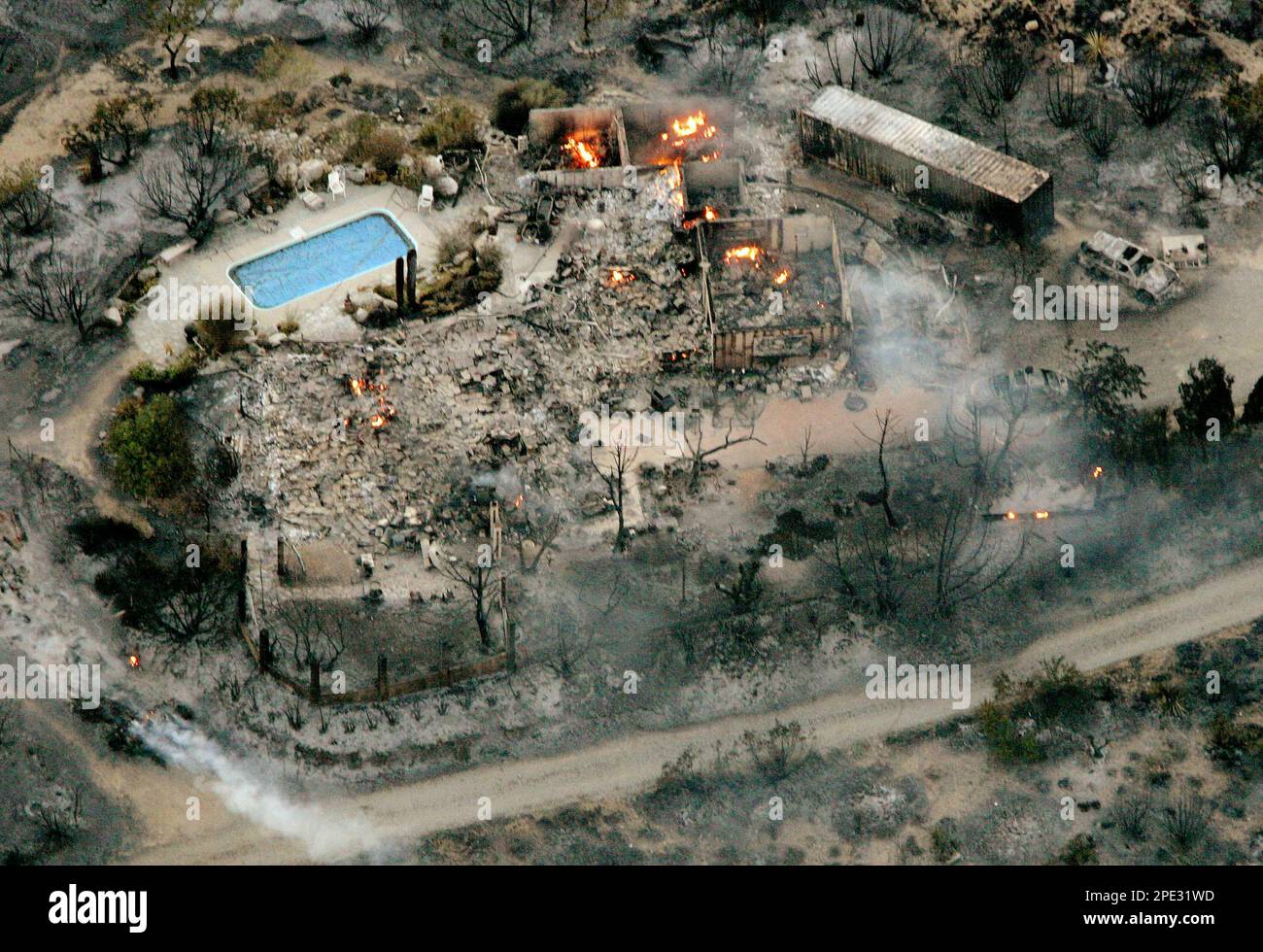 A home destroyed by a wildfire that moved through the Mojave Desert ...