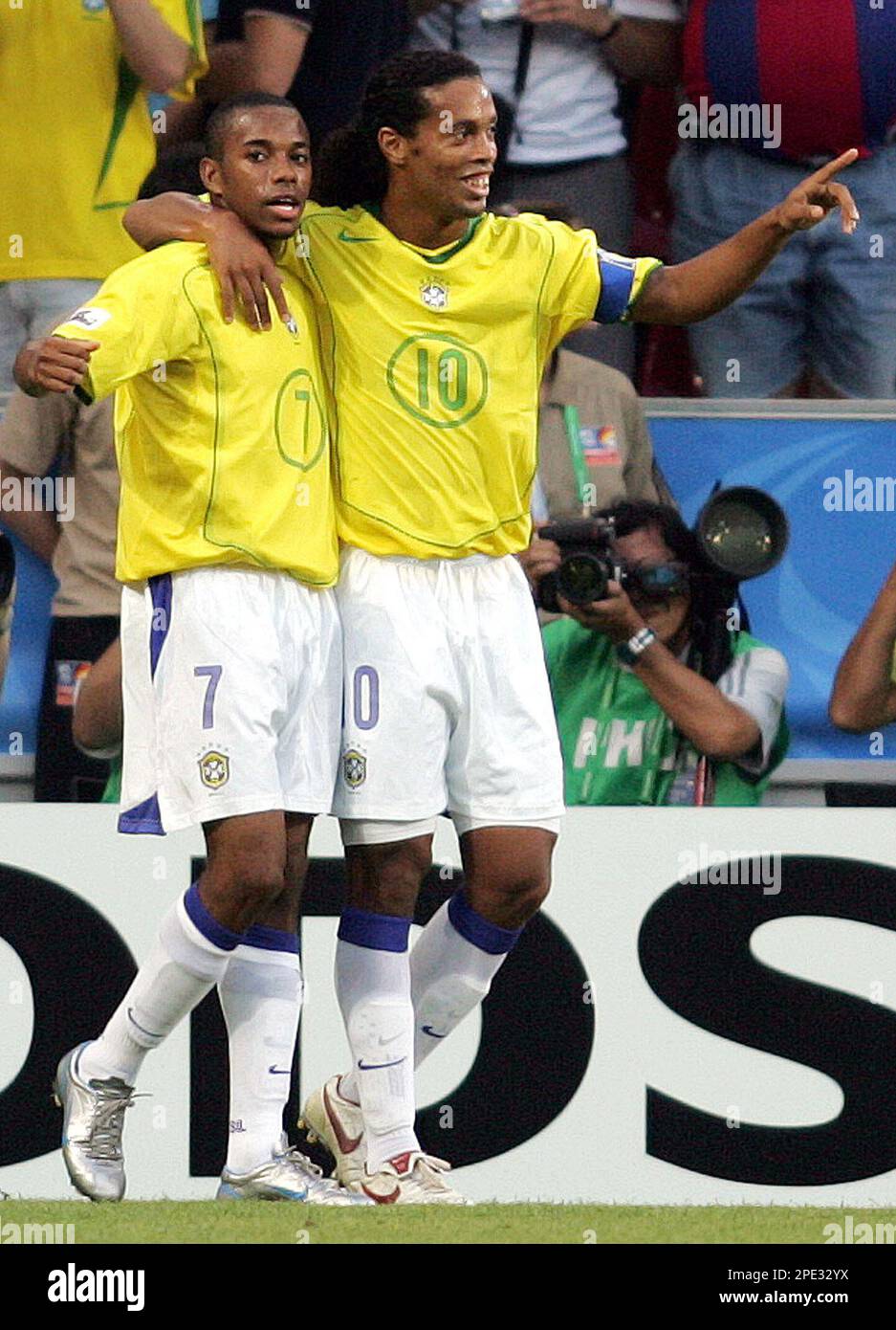 Brazil's scorer Robinho, left, and Ronaldinho, right, celebrate during ...