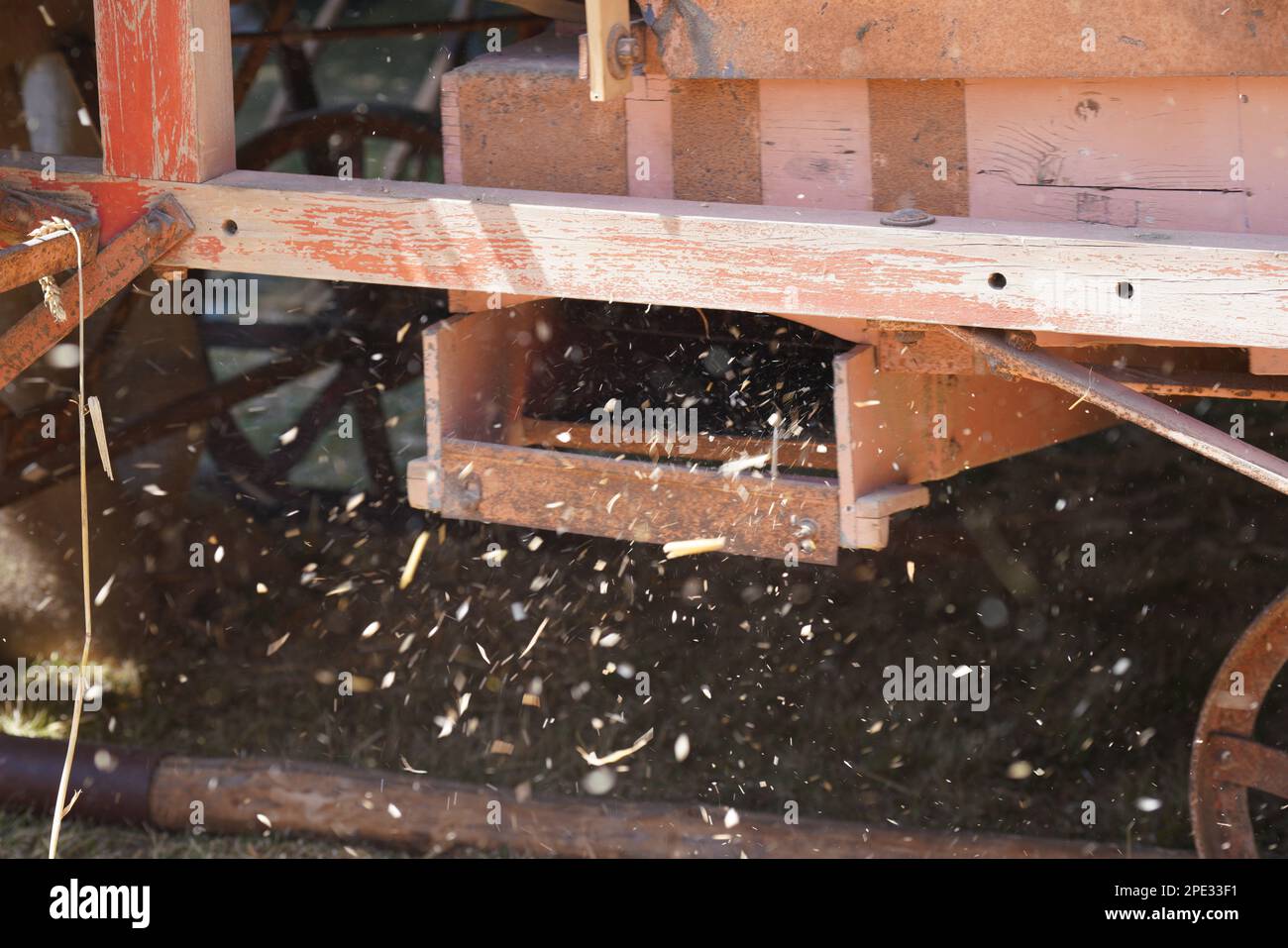 Grain harvest and processing with old traditional equipment Stock Photo ...