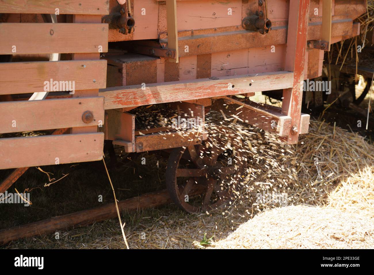 Grain harvest and processing with old traditional equipment Stock Photo ...
