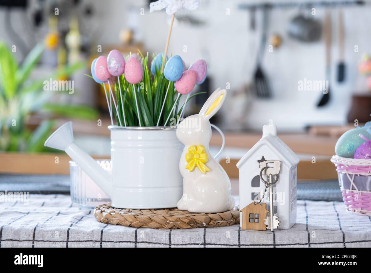 Key to house of cozy home with Easter decor with rabbit and eggs on ...