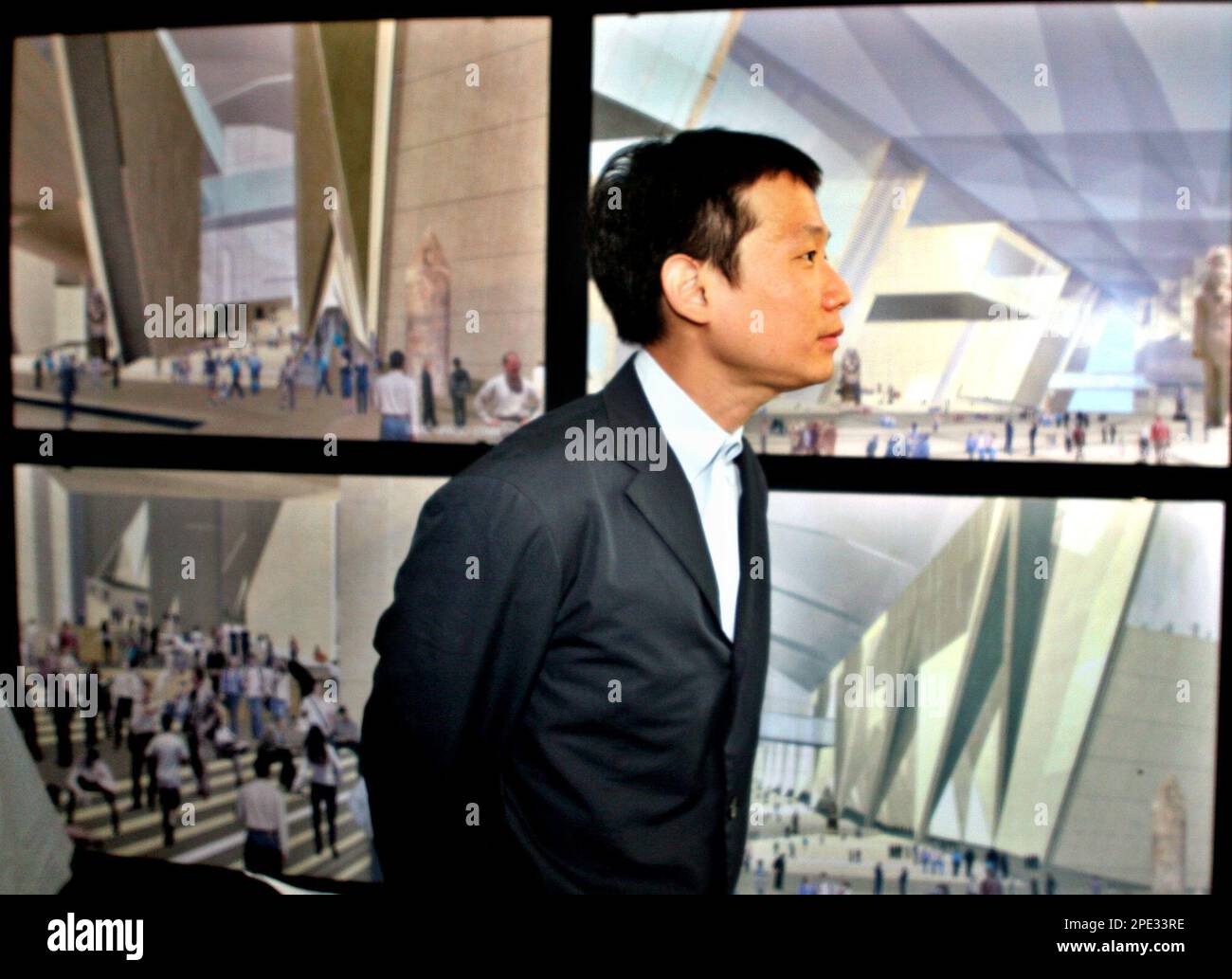 Irish Shih-Fu Peng of the Dublin firm Heneghan in front of his designs ...