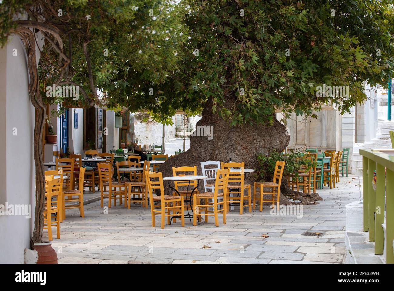 Greece. Tinos island Cyclades. Outdoors traditional cafe at Pyrgos ...