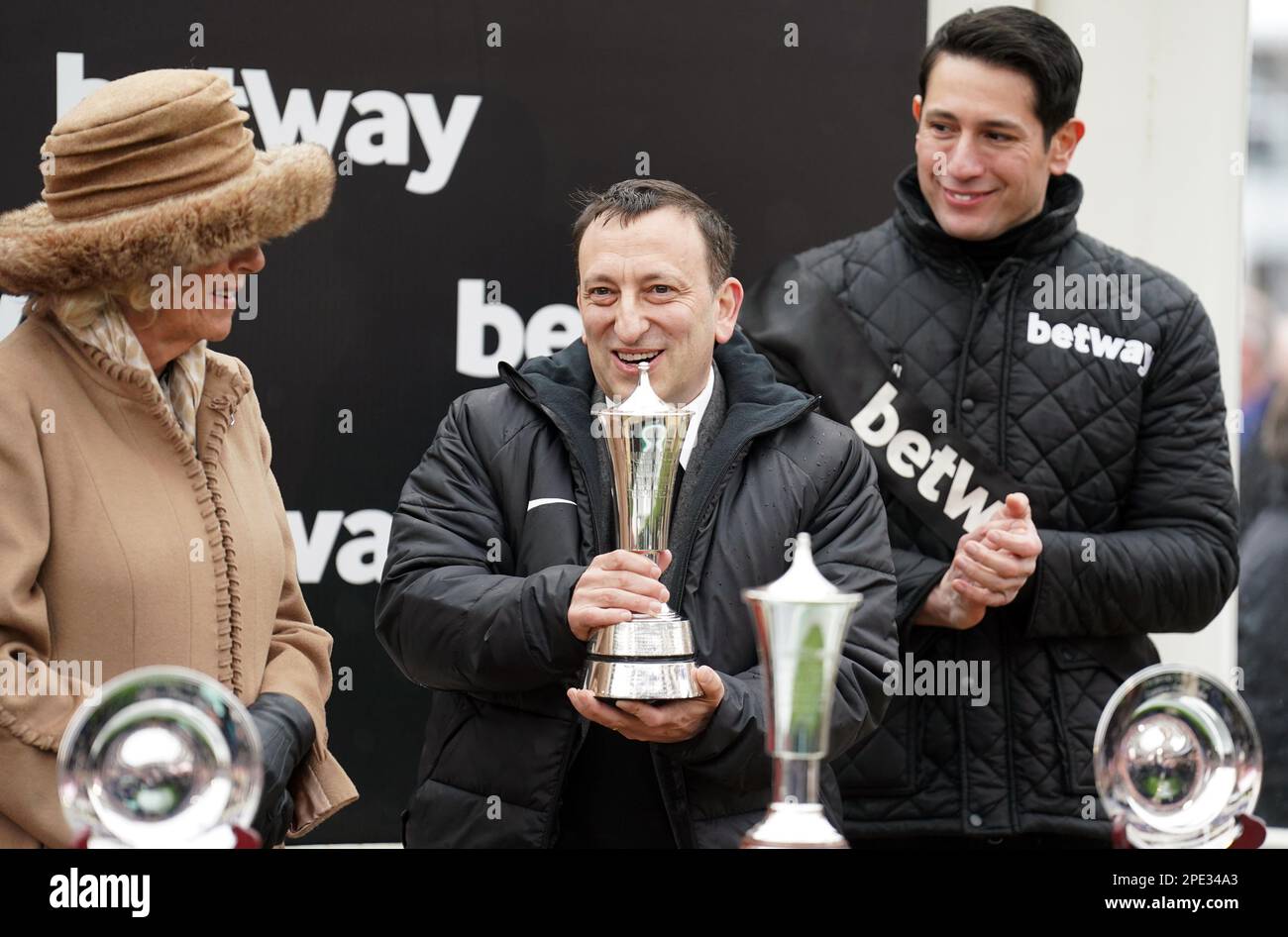 Winning owner Tony Bloom, alongside the Queen Consort, after being ...