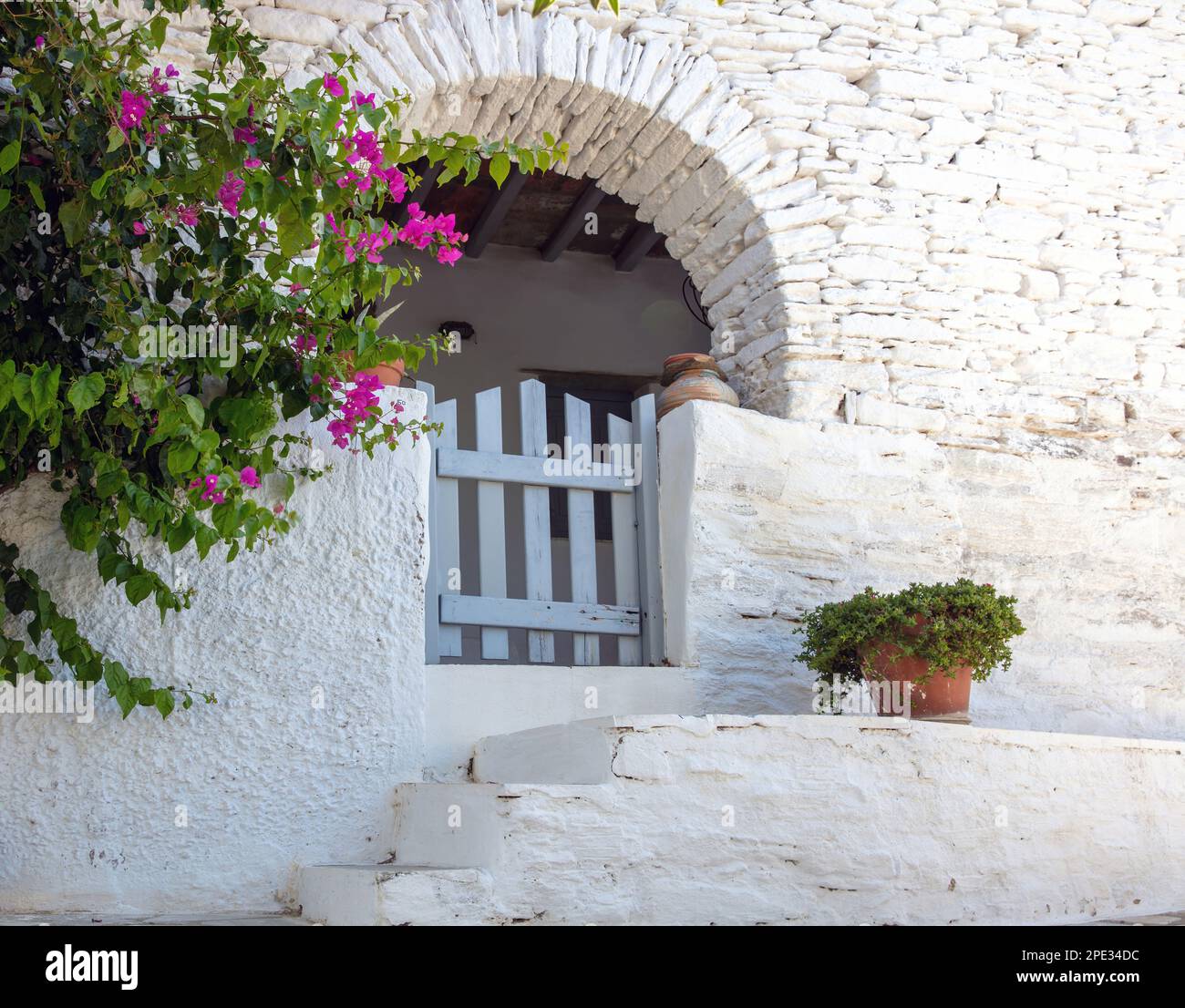 Greece. Tinos island, Dio Horia village. Cycladic architecture grey ...
