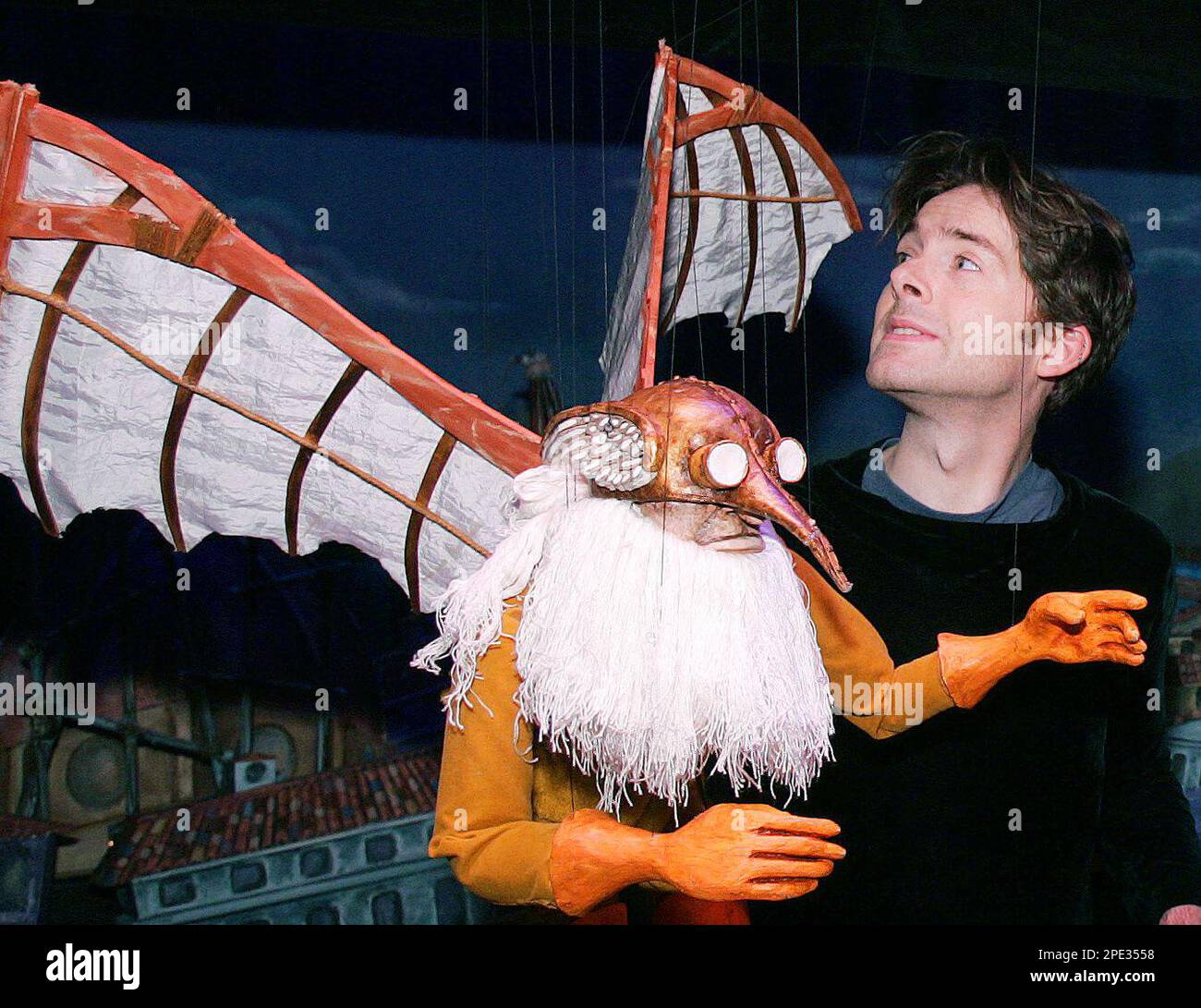Center for Puppetry Arts resident puppeteer Jason Hines is shown with a ...