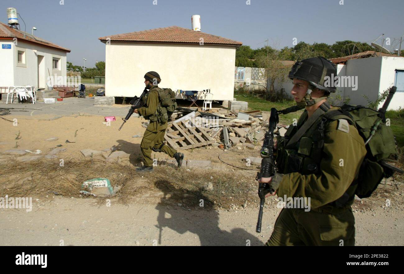Israeli soldiers patrol the Jewish settlement of Kfar Darom in central ...