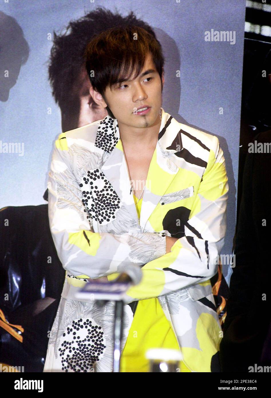 Taiwanese actor Jay Chou poses for photographers during a press ...