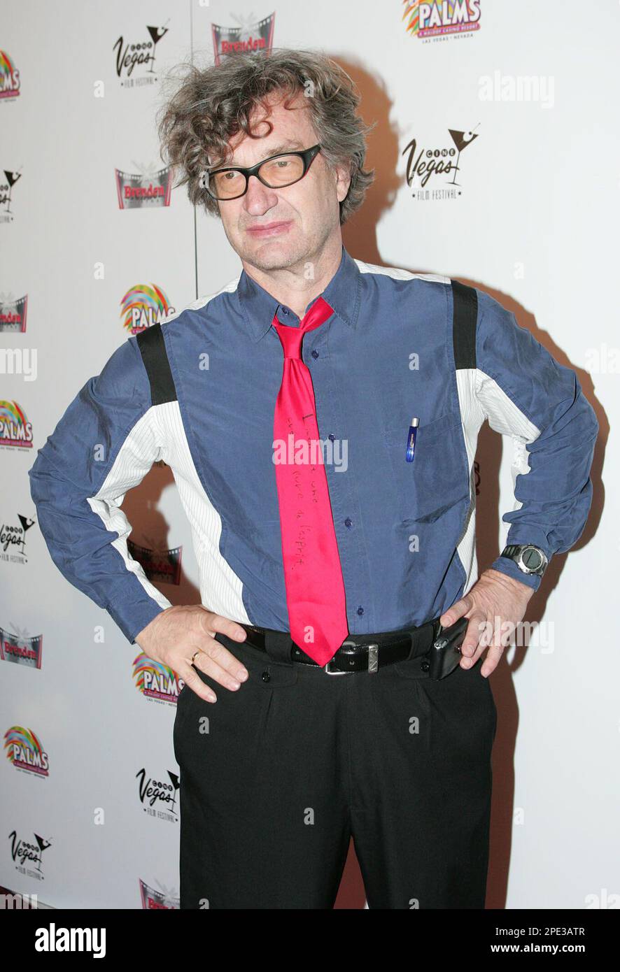 Director Wim Wenders poses on the red carpet just before the screening ...