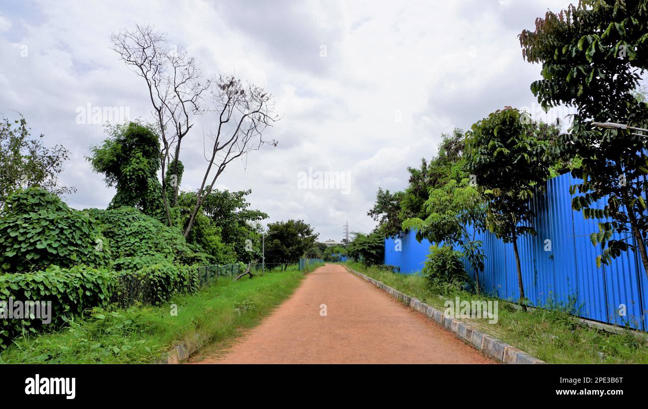 Landscape view of walking lane of Agara lake. Well maintained lake and ...
