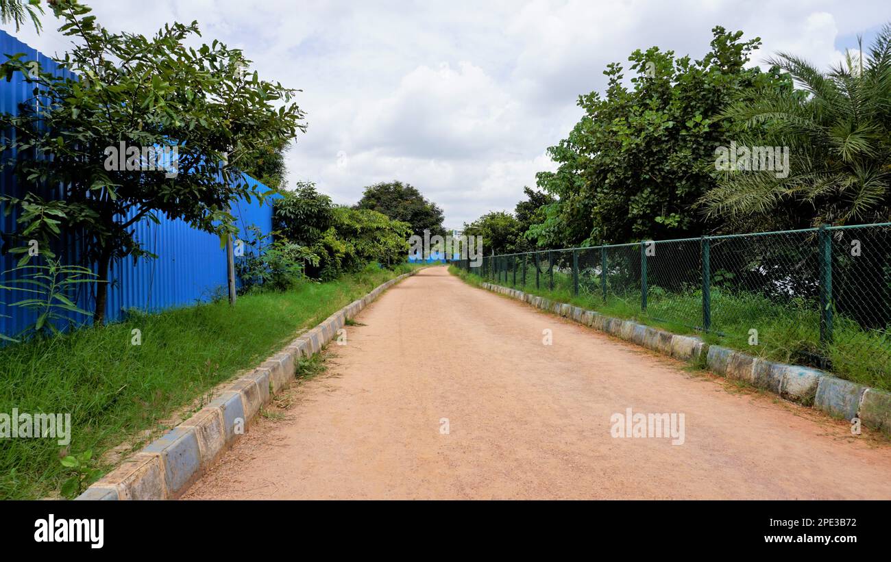 Landscape view of walking lane of Agara lake. Well maintained lake and ...