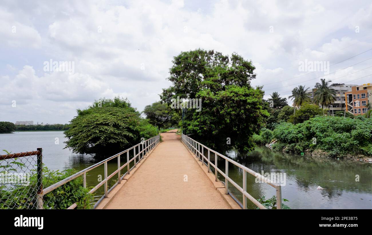 Landscape view of walking lane of Agara lake. Well maintained lake and ...