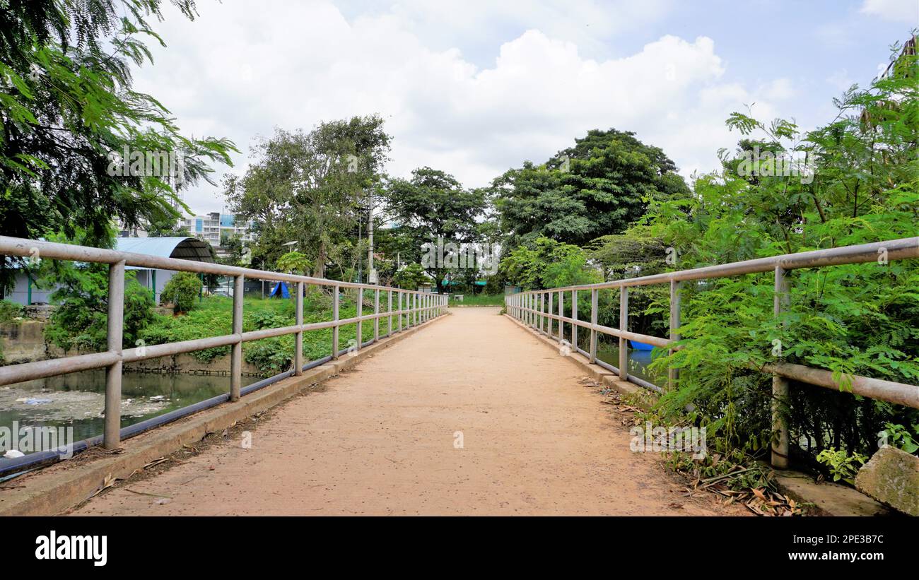 Landscape view of walking lane of Agara lake. Well maintained lake and ...