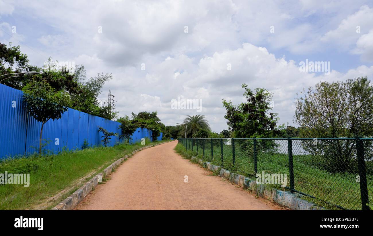 Landscape view of walking lane of Agara lake. Well maintained lake and Part of Varthur lake ...