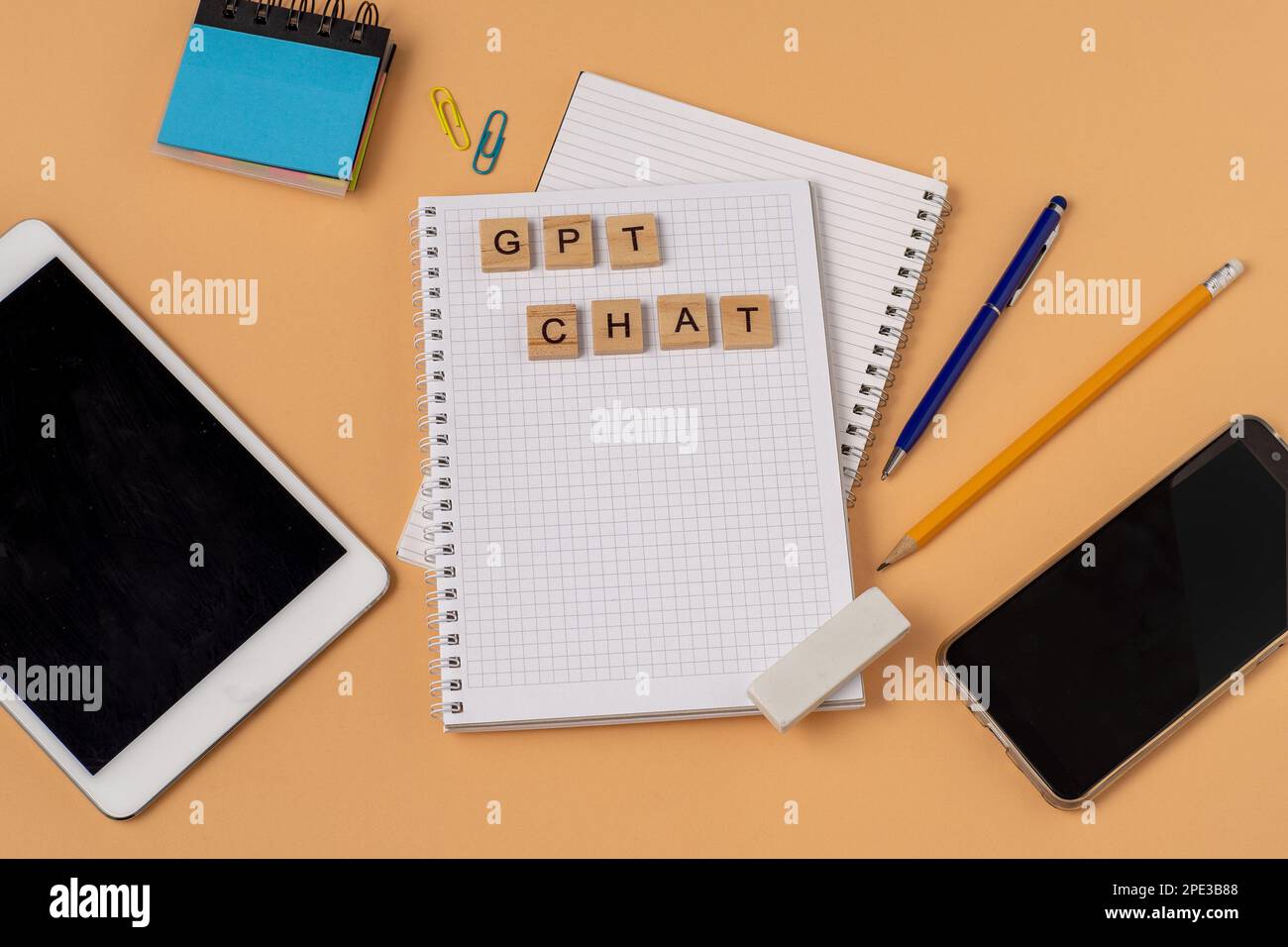 Work and study background with the help of a chatGPT bot. Words in wooden letters. Table top ...