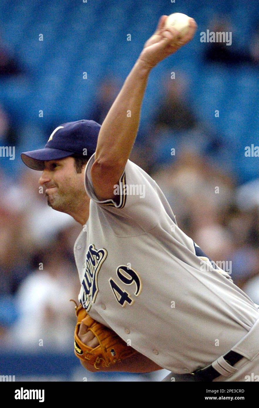 Milwaukee Brewers pitcher Doug Davis delivers a pitch against the ...