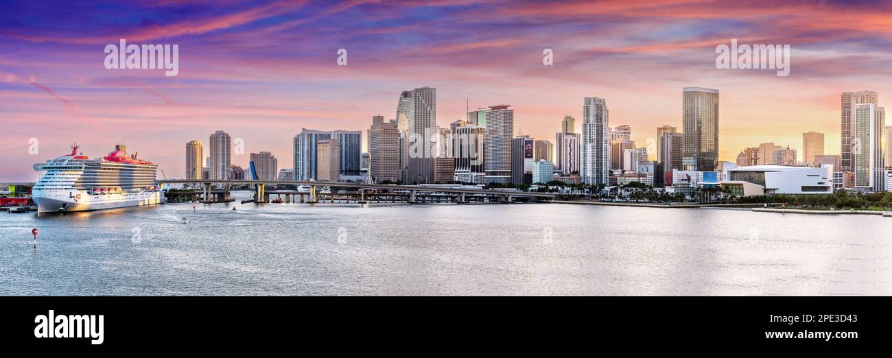 Skyline of Miami at Sunset, With Cruise Ship docked ready to leave Port ...