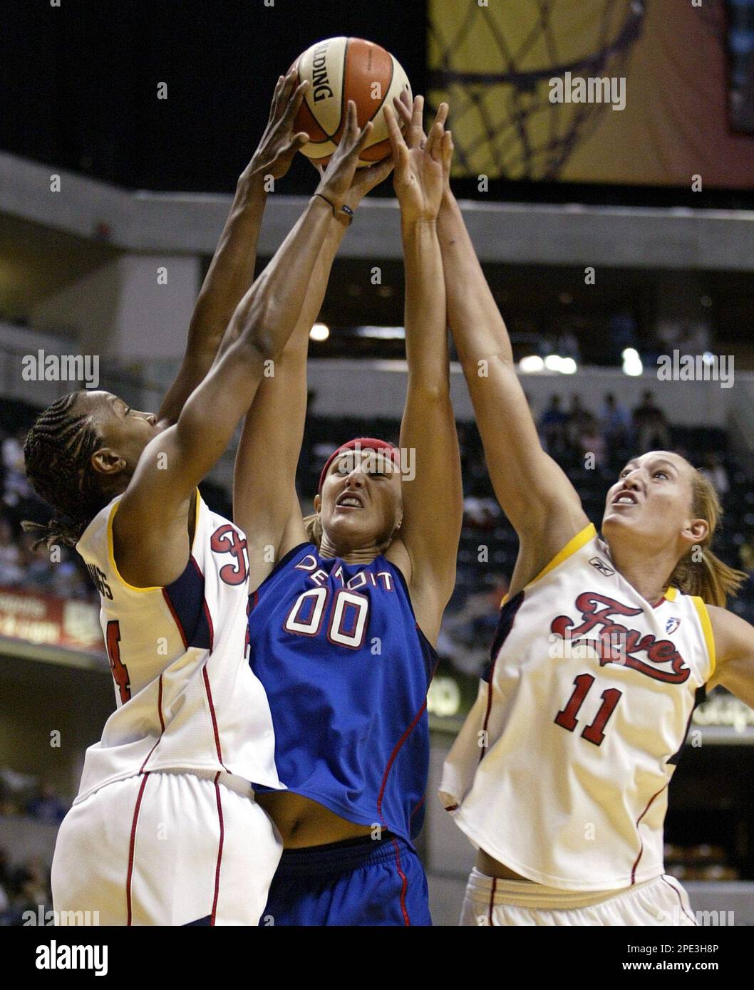 Detroit Shock's Ruth Riley (00) has her shot blocked by Indiana Fever's ...