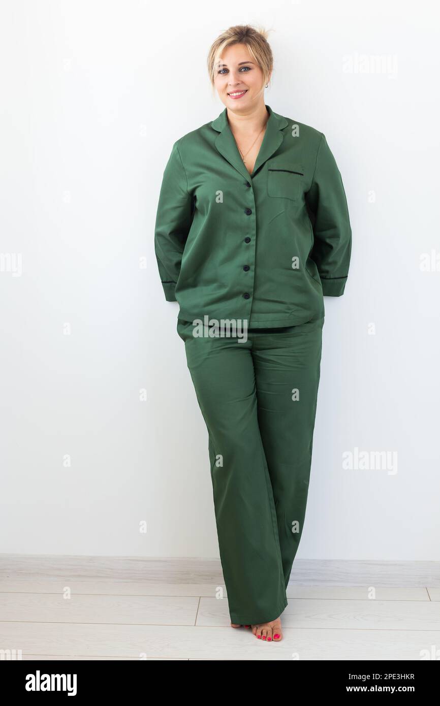 Glamorous woman wears pajama with happy smile chilling in good morning ...