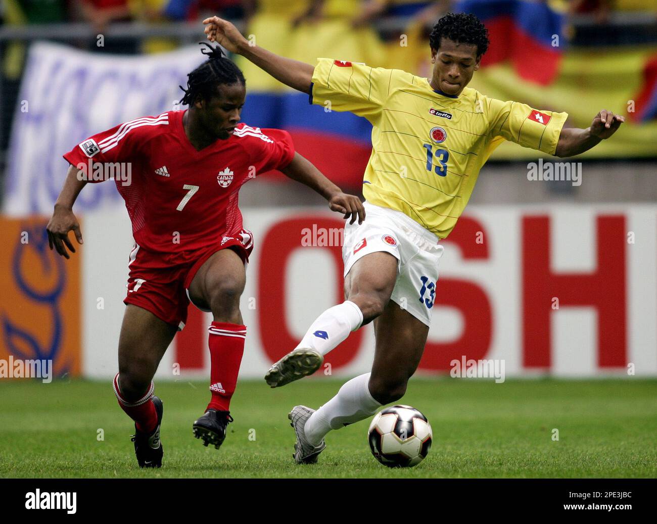 Canada's soccer player Jaime Peters, left, and Fredy Guarin of Colombia ...