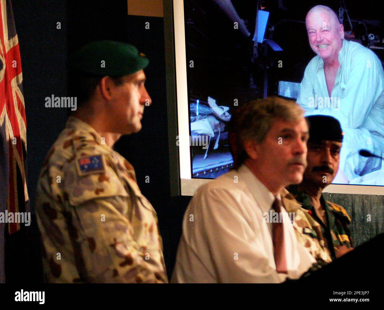 Australian Defense Attache, Colonel John Mansell, left, Nick Warner ...