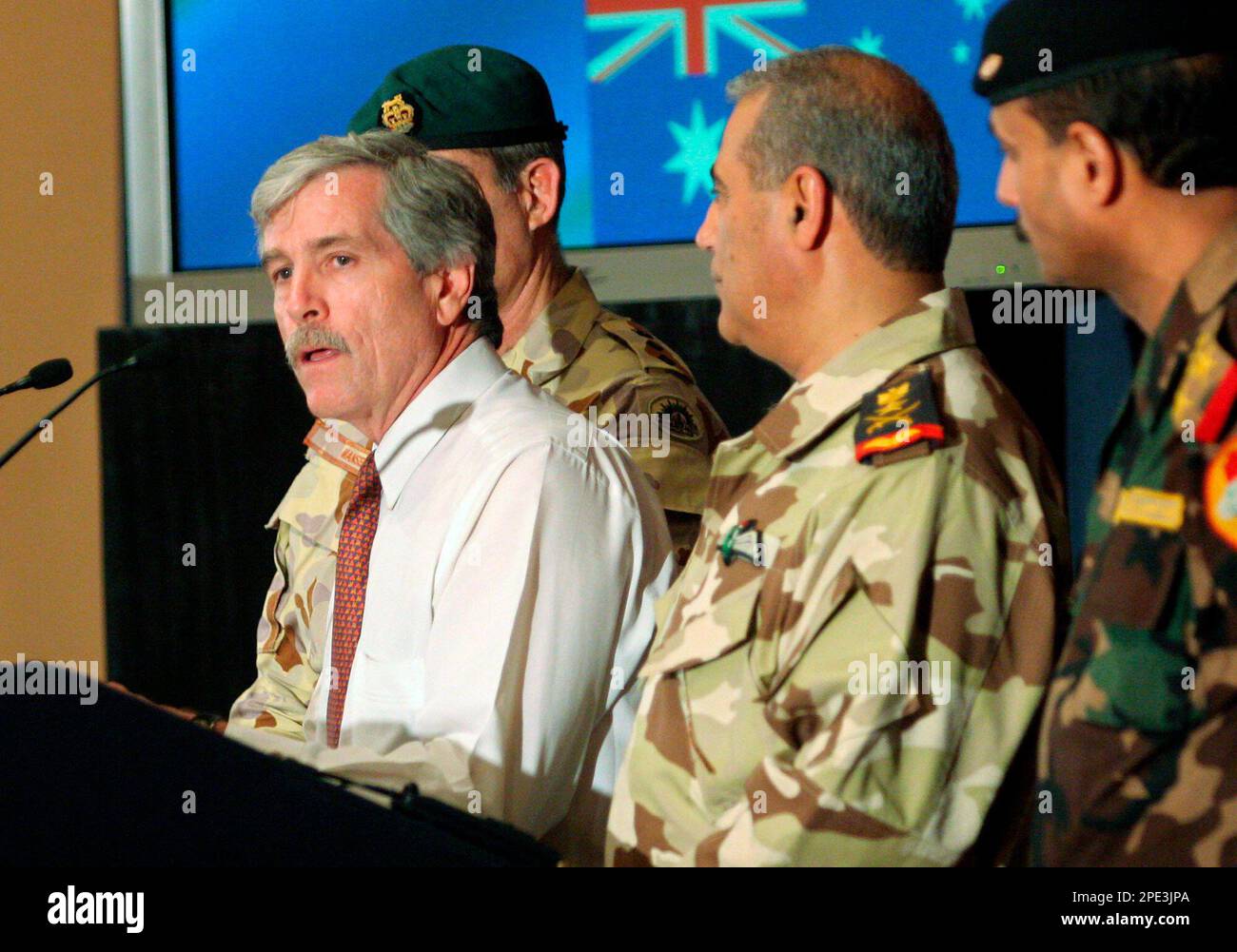 Nick Warner, Australia's Deputy Secretary of Foreign Affairs and Trade, left, Australian Defense ...