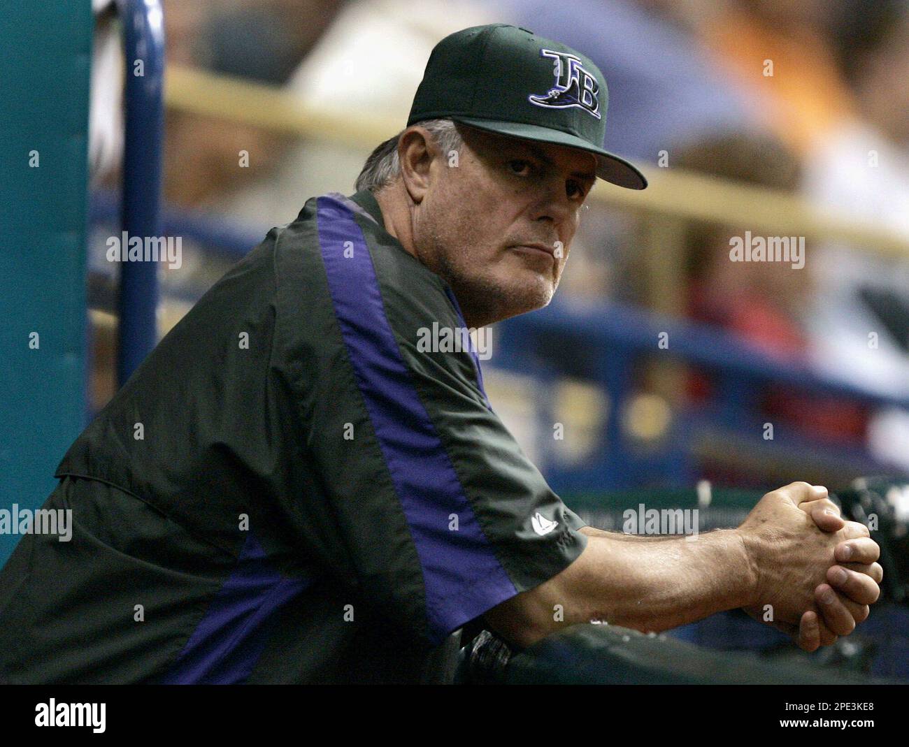 Tampa Bay Devil Rays manager Lou Piniella looks out of the dugout ...
