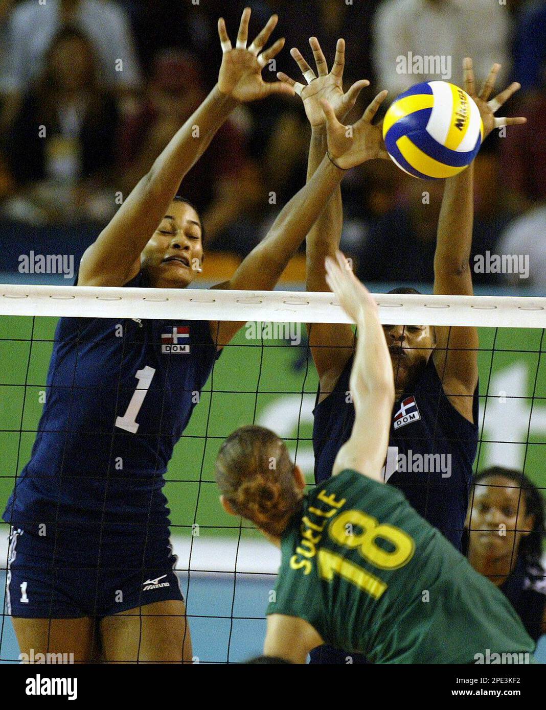 Dominican Republic's Annerys Rodriguez (1) and Sofia Mercedes, right ...