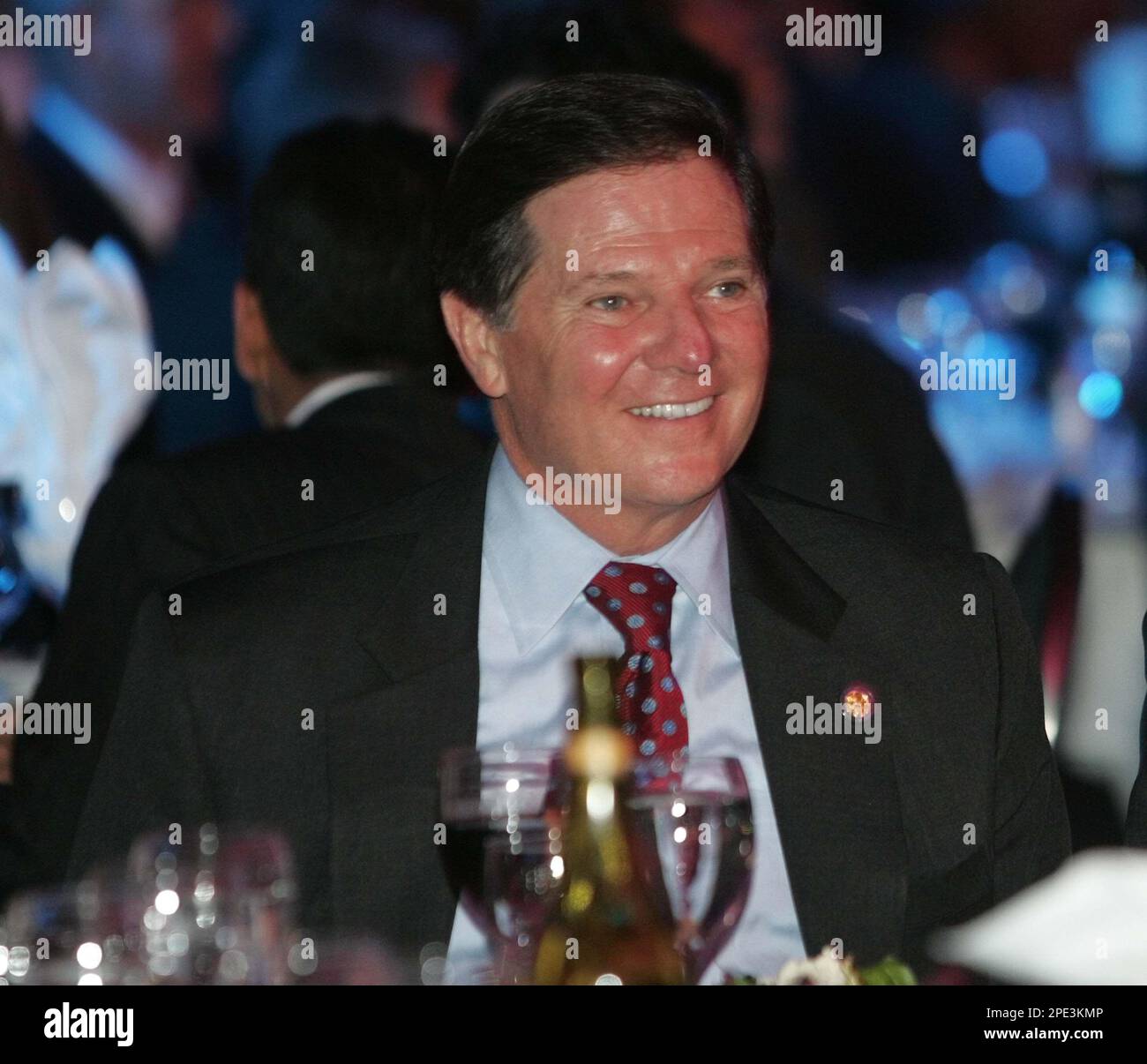 Majority Leader Rep. Tom DeLay, R-Texas, takes his seat as he attends ...
