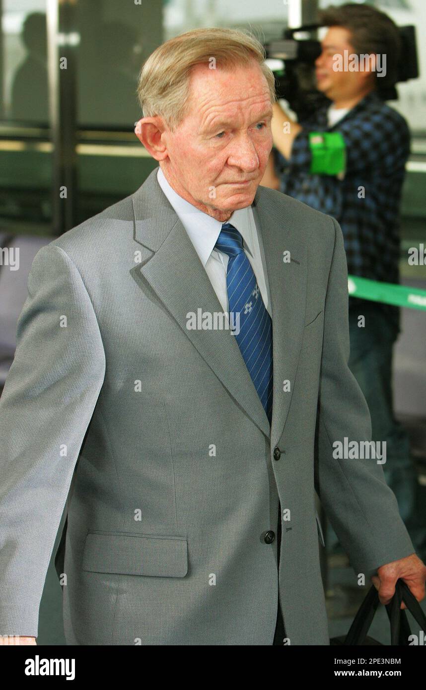 Former U.S. Army deserter Charles Jenkins prepares to board a plane at ...