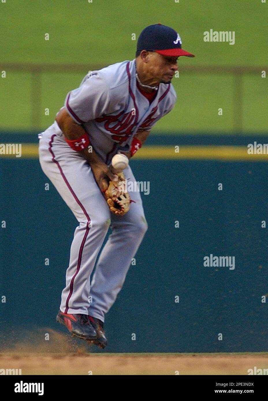 Atlanta Braves shortstop Rafael Furcal bobbles a single by Texas ...