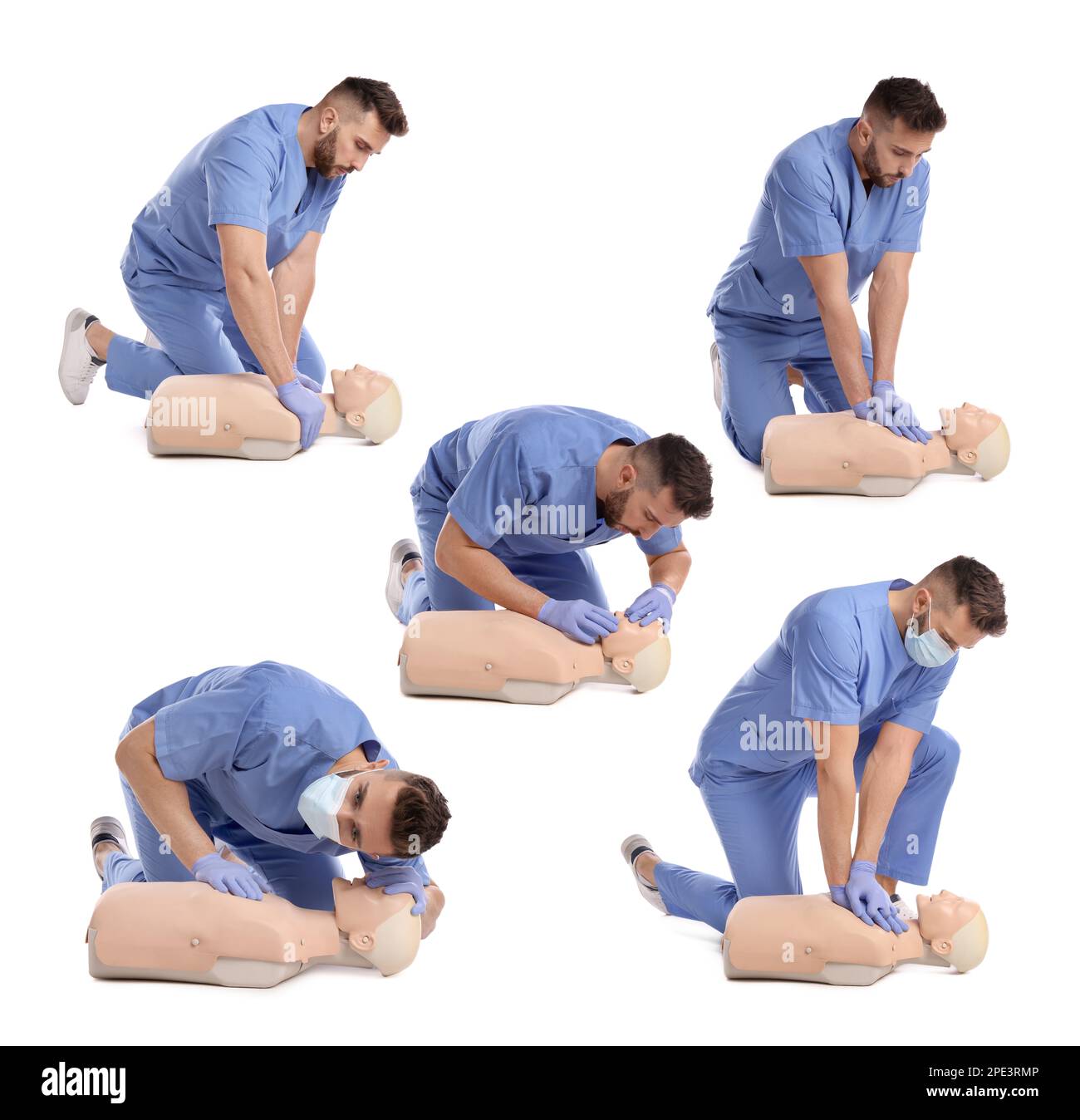 Doctor practicing first aid on mannequin against white background ...