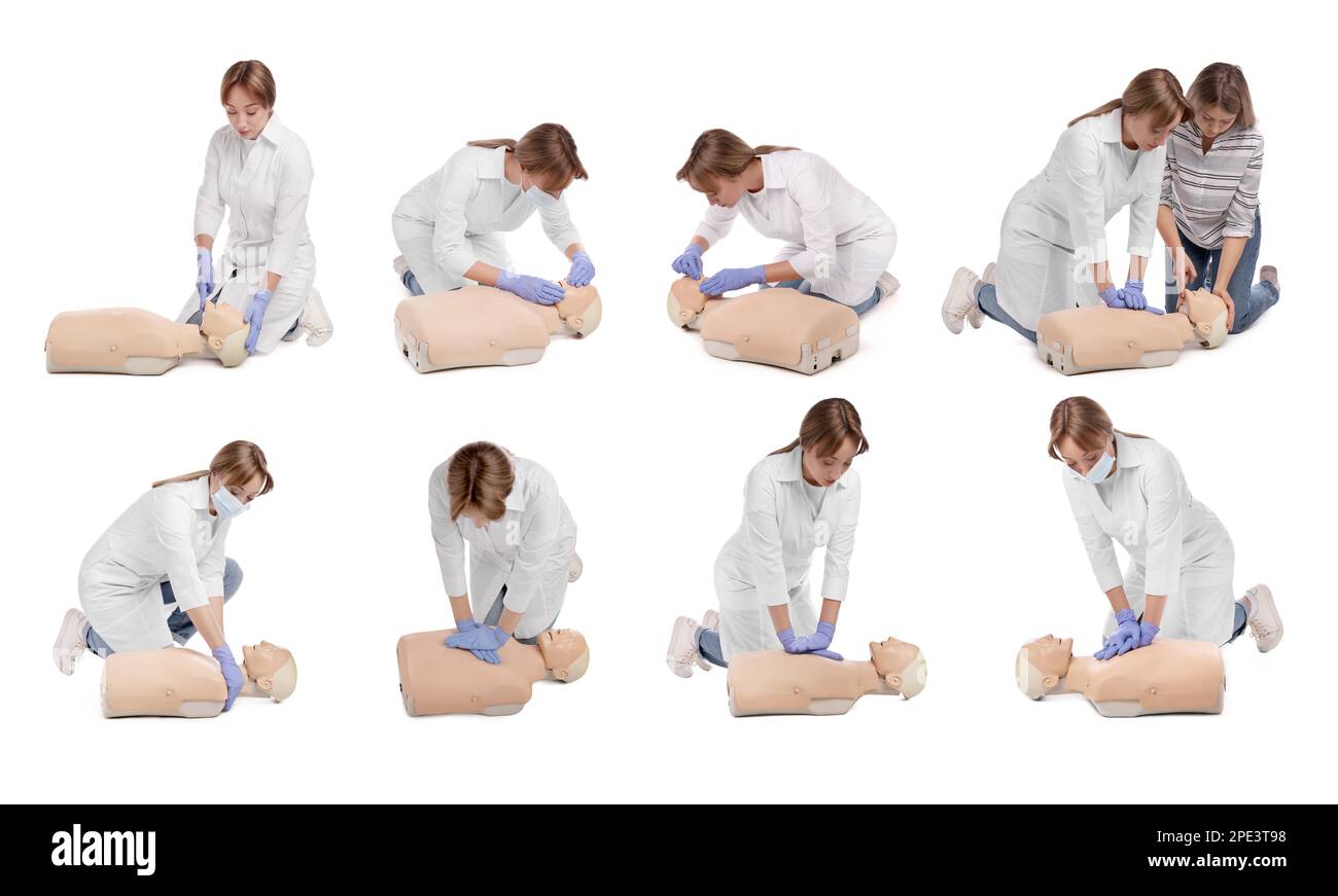 Doctor practicing first aid on mannequin against white background ...