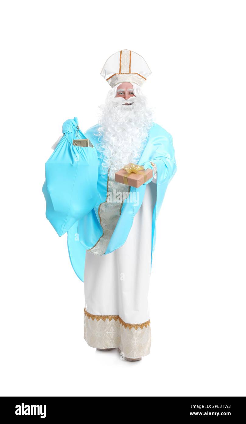 Full length portrait of Saint Nicholas holding sack with presents on ...