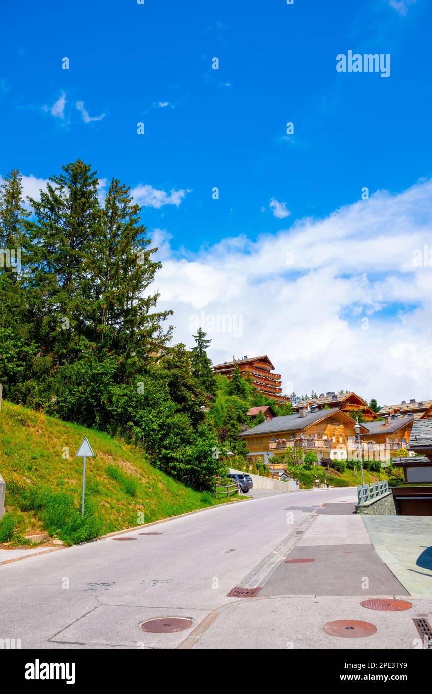 City Street with House and Hotel in a Sunny Day in Crans Montana, Valais in Switzerland Stock ...