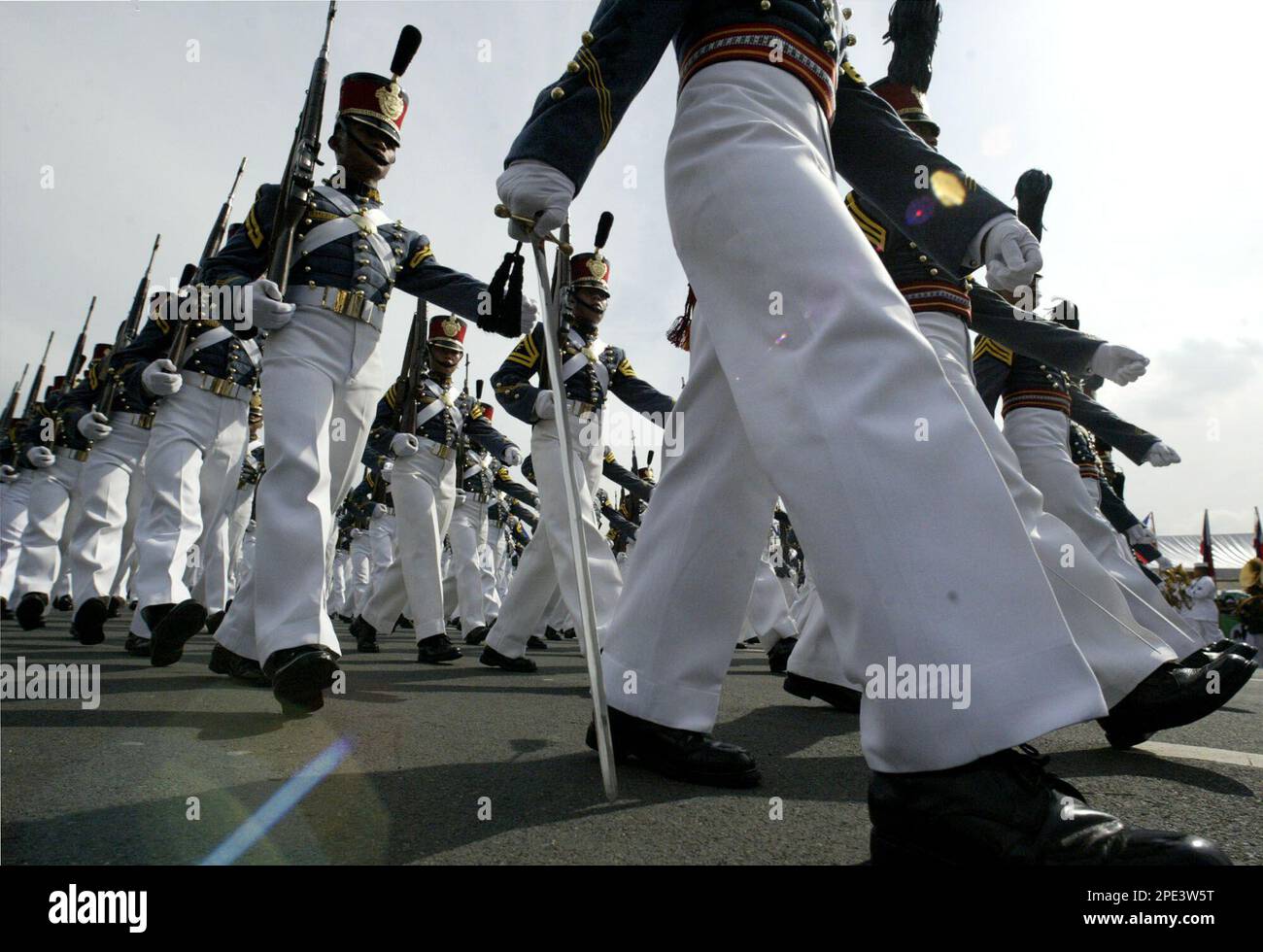 Filipino cadets march as they mark the 107th Philippine Independence ...