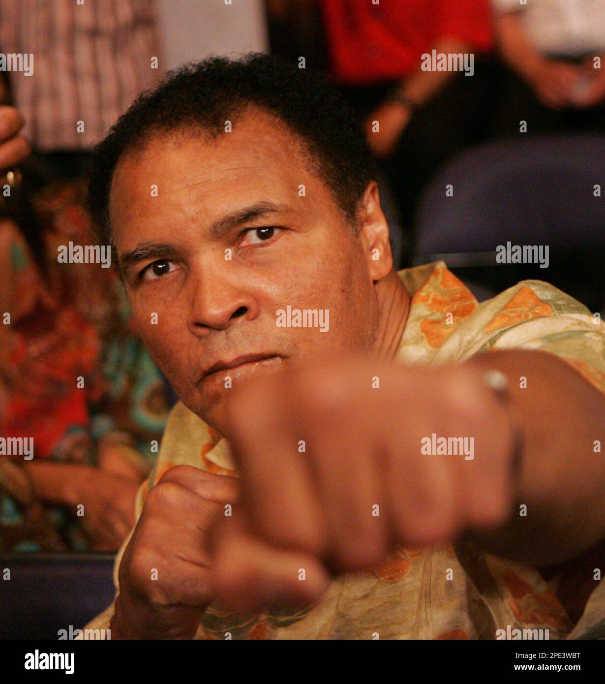 Boxing great Muhammad Ali gestures upon his arrival at the MCI Center ...