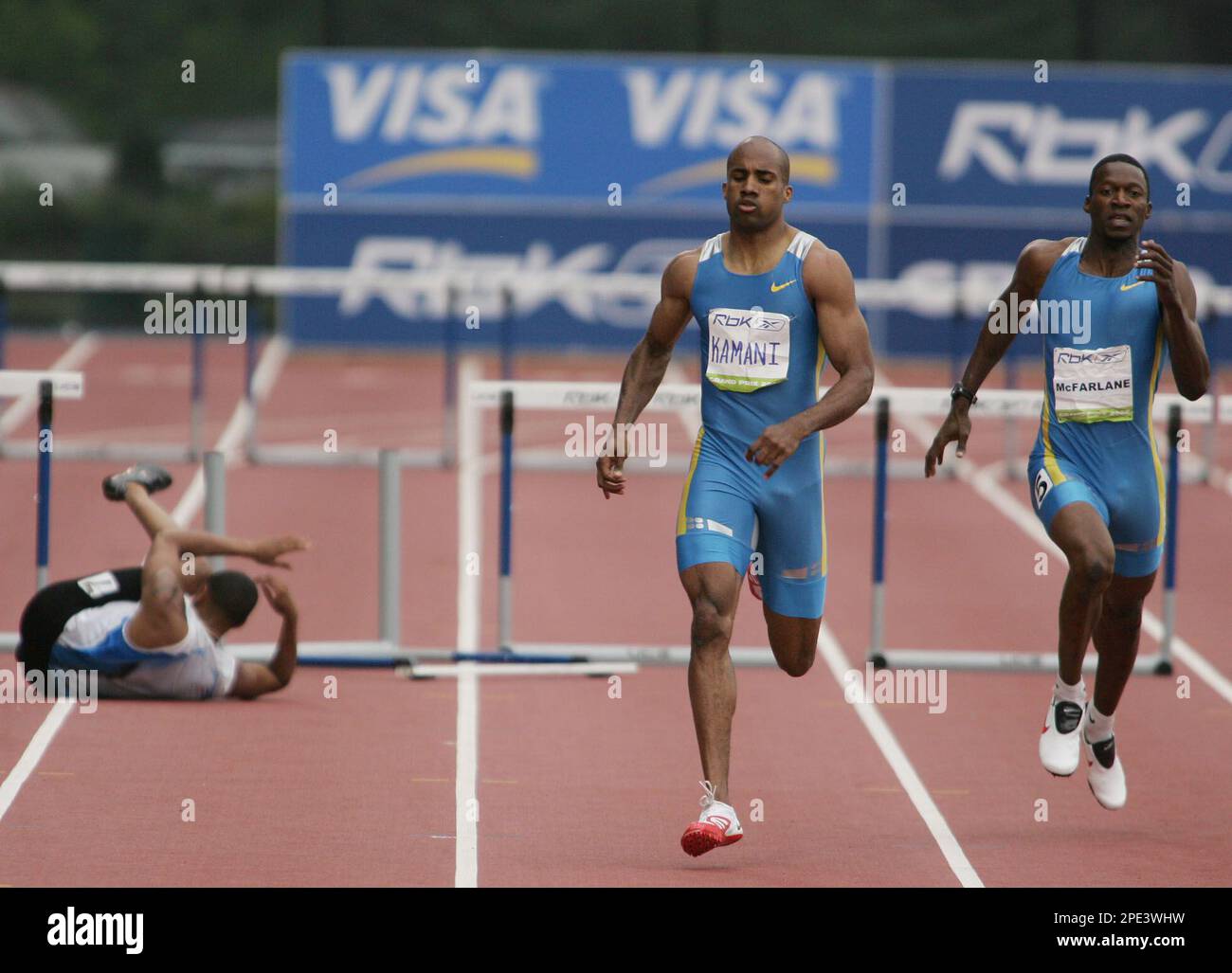 Bayano Kamani, center, wins the 400-meter hurdles at the Reebok/NYC ...