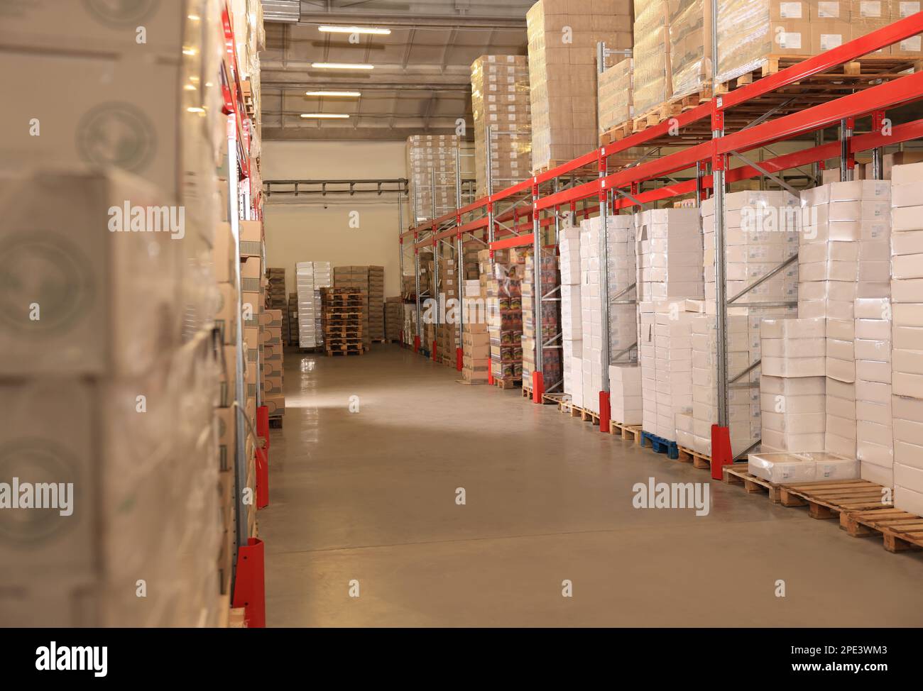 Warehouse with lots of products. Wholesale business Stock Photo - Alamy