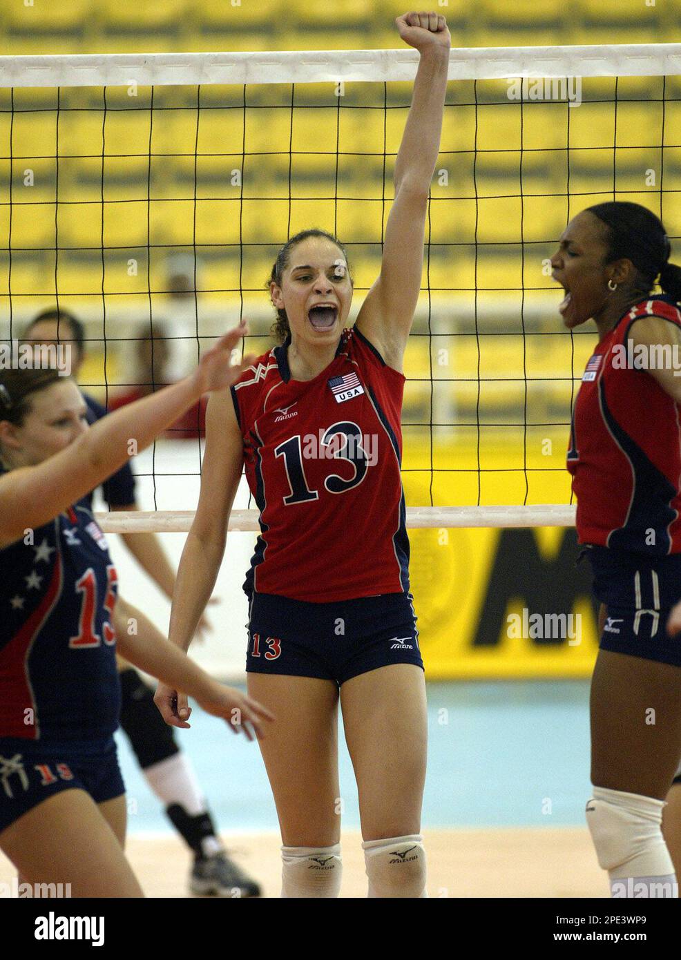 USA's players, inlcluding Elisha Thomas, center, celebrate after ...