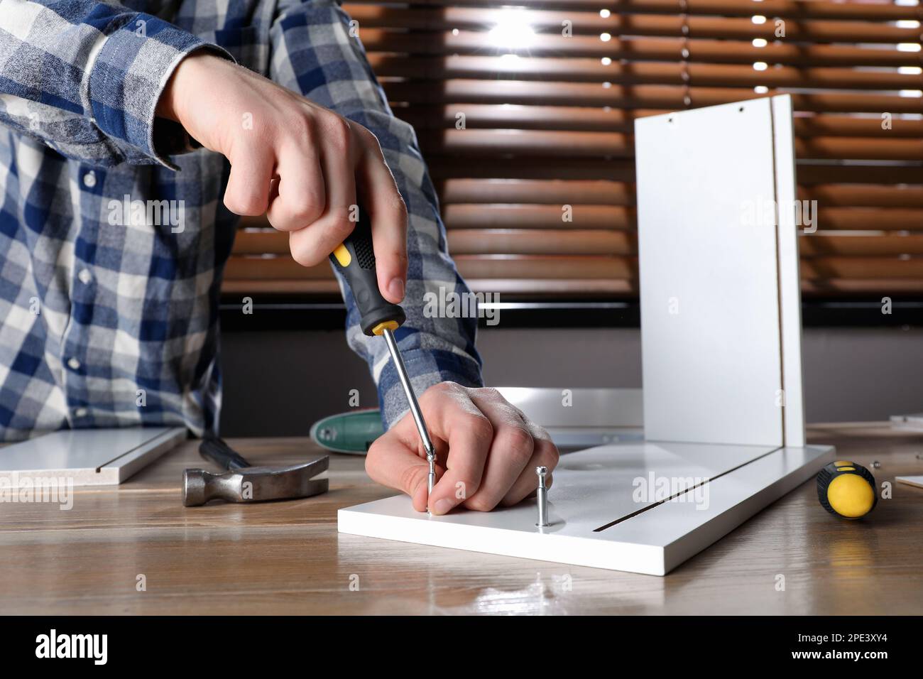 Closeup man hands assembling new hi-res stock photography and images ...