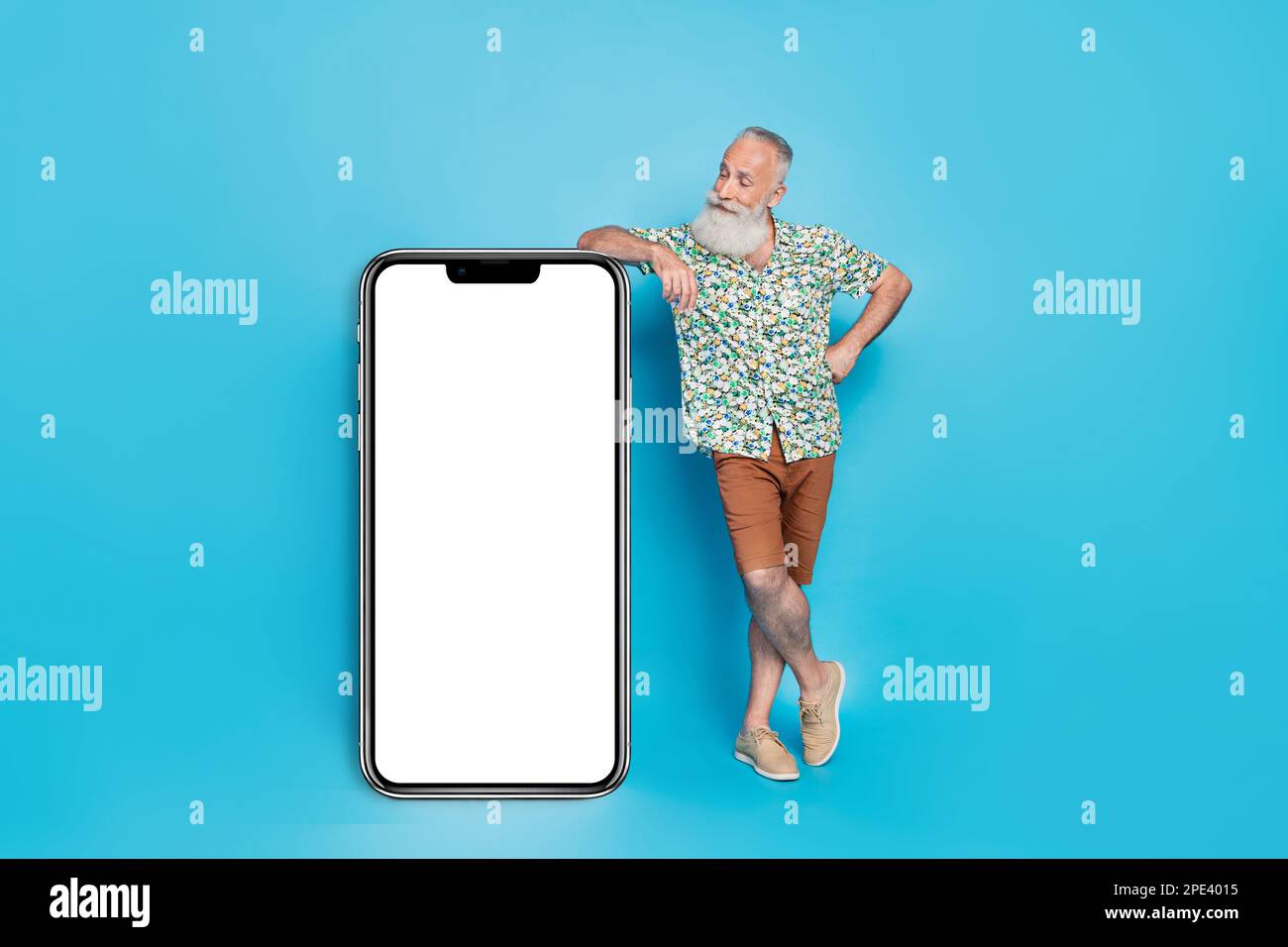 Full body photo of positive aged man look big empty space telephone ...