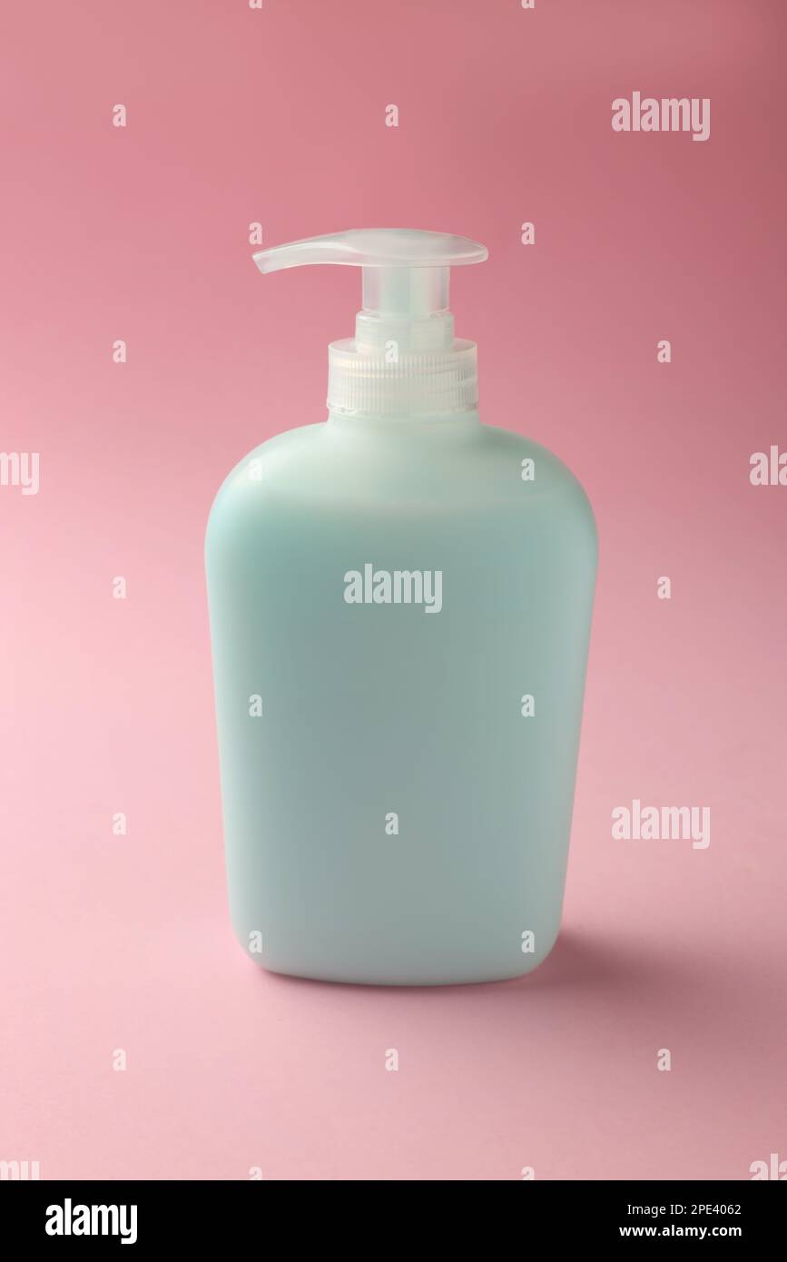 Bottle of liquid soap on pink background Stock Photo - Alamy