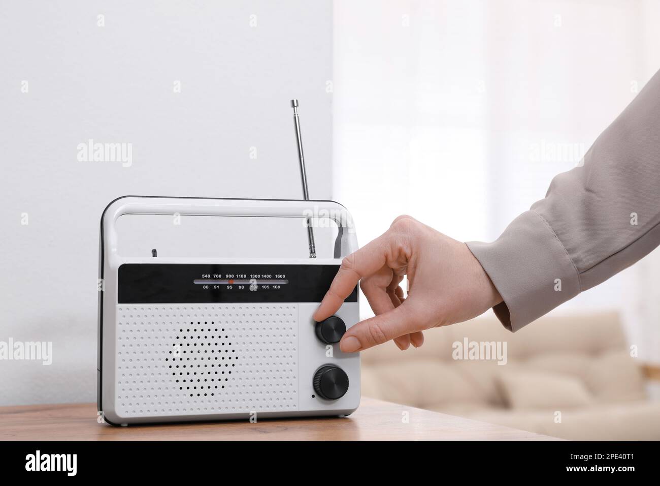Volume knob on stereo hand hi-res stock photography and images - Alamy