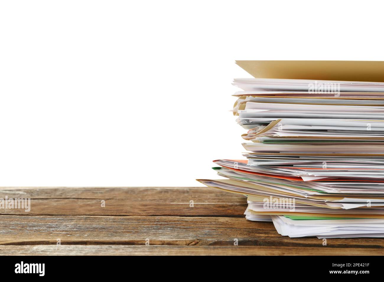 Stack of different files with documents on wooden table against white ...