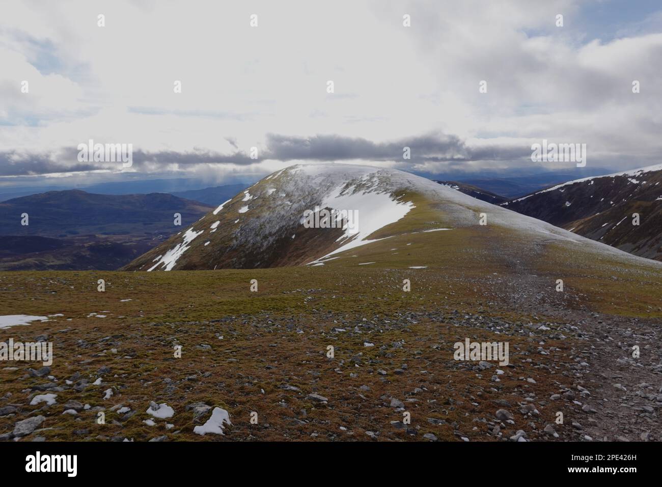 Looking back from the summit cairn of Munro Carn nan Ghaber towards ...
