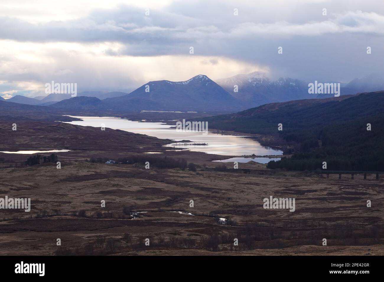 Winter view across Rannoch Moor and Loch Laidon with the mountains of ...