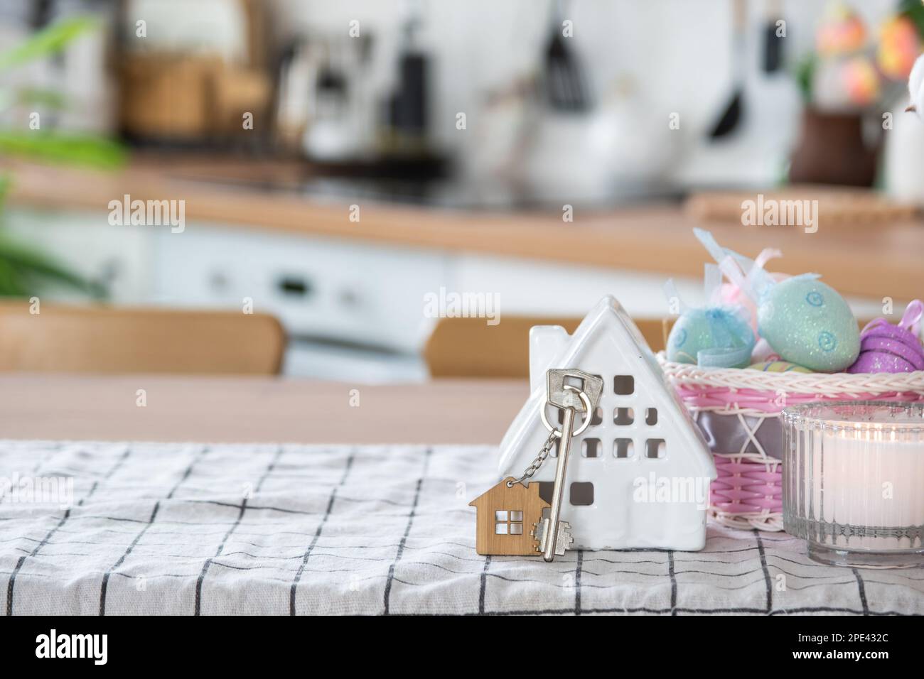 Key to house of cozy home with Easter decor with rabbit and eggs on ...
