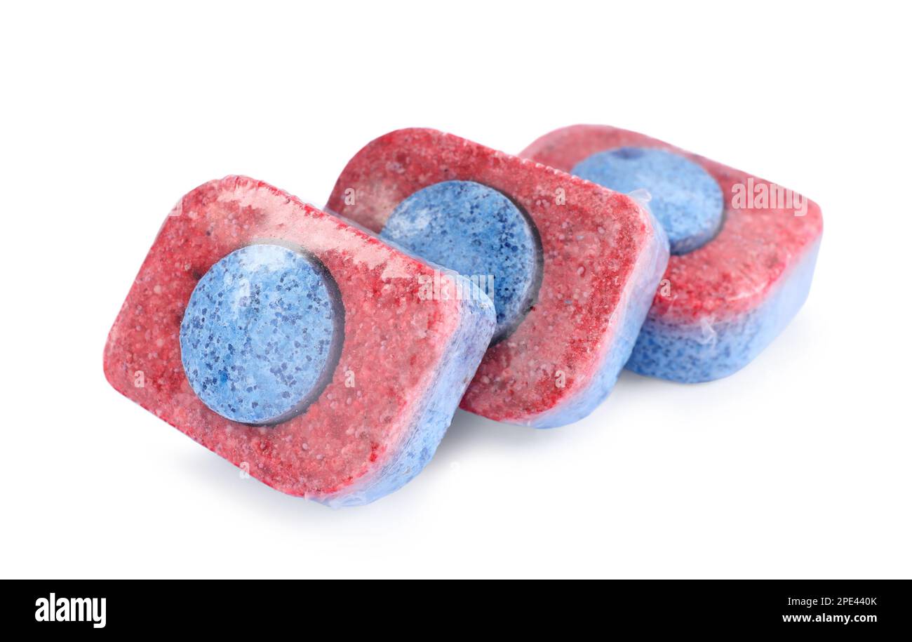 Three dishwasher detergent tablets on white background Stock Photo - Alamy